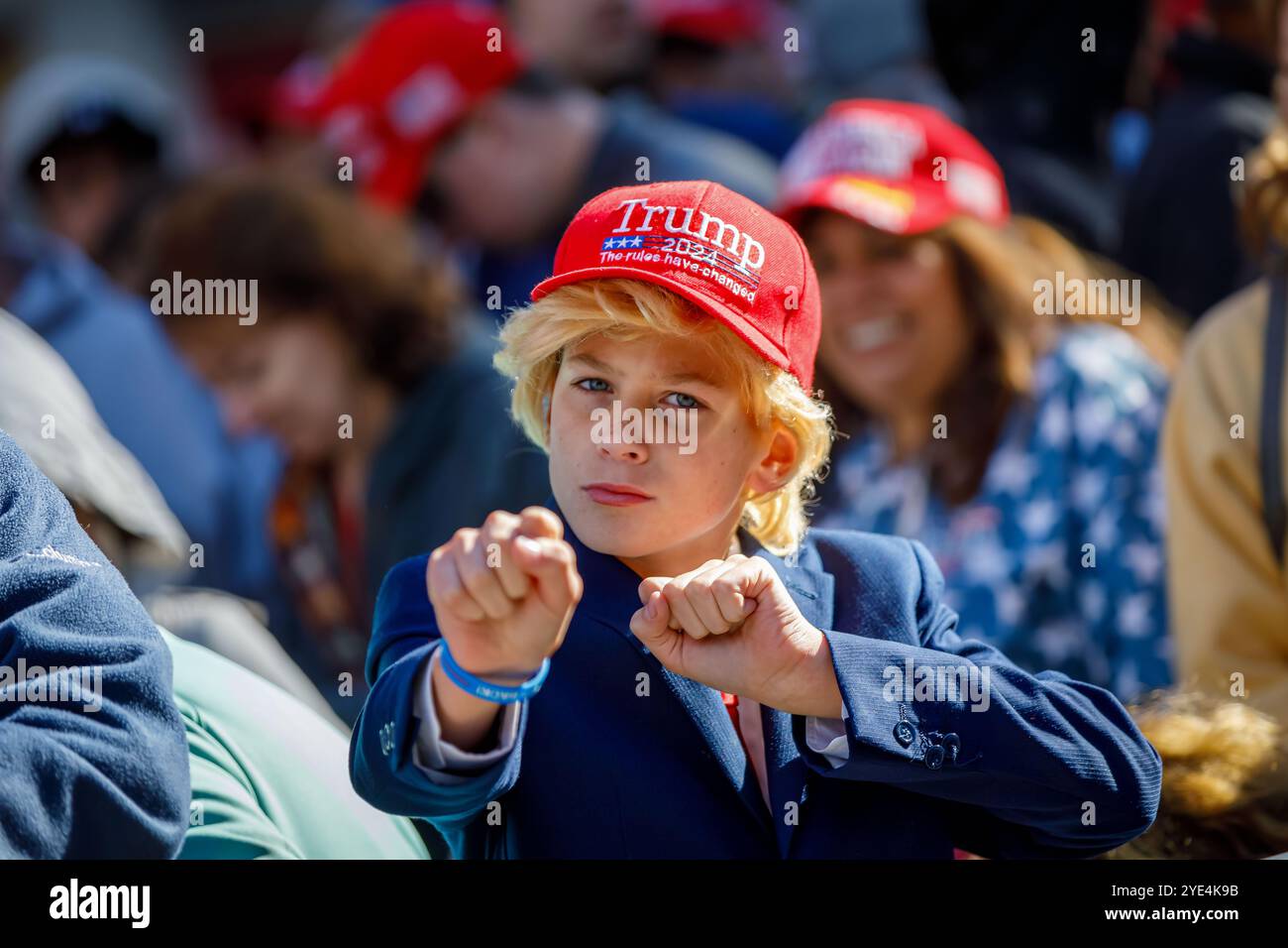 NEW YORK, NEW YORK - OCTOBER 27: A young supporter performs a “Trump ...