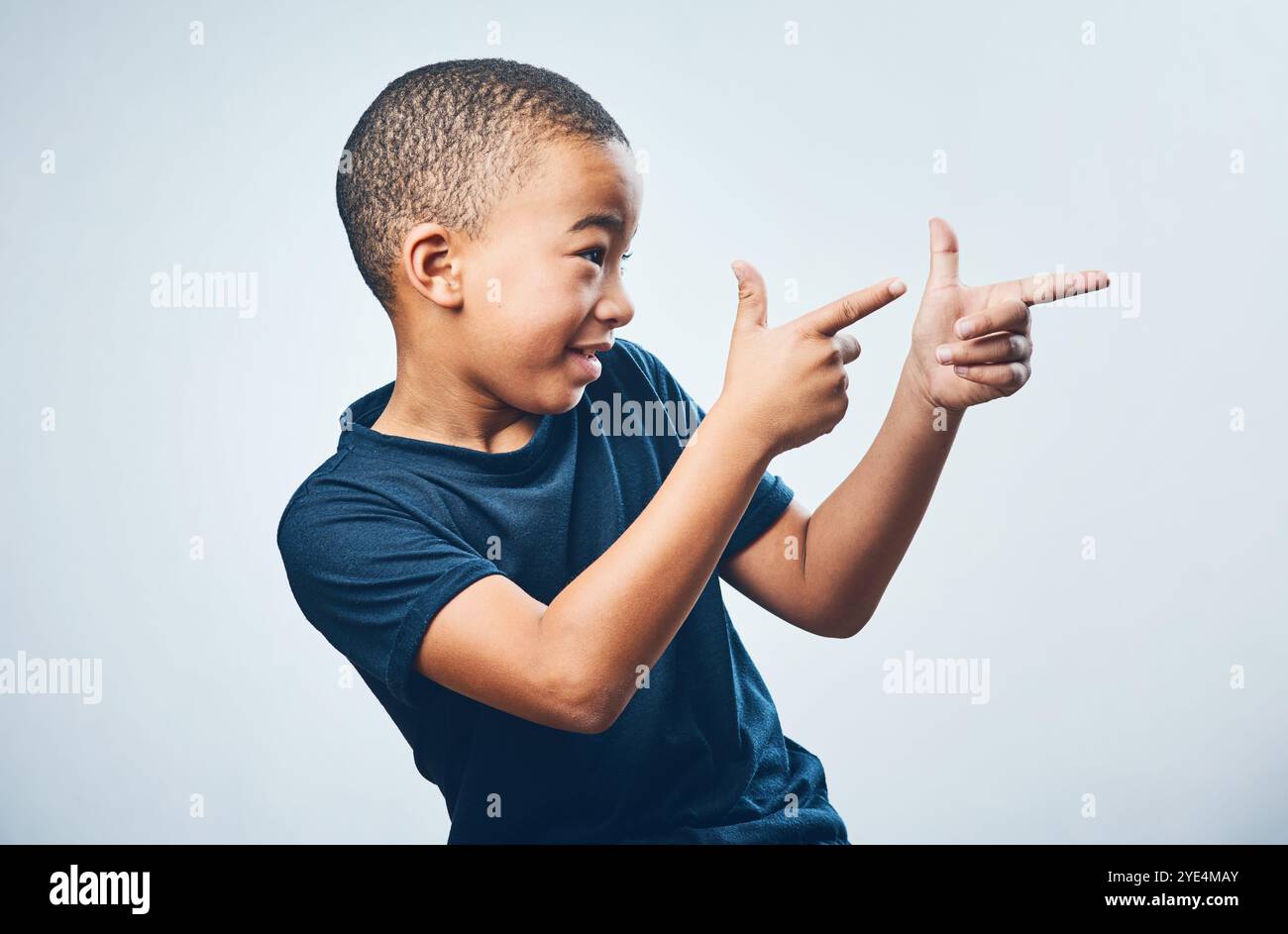 Boy, pointing and showing with opportunity, choice and expression on ...