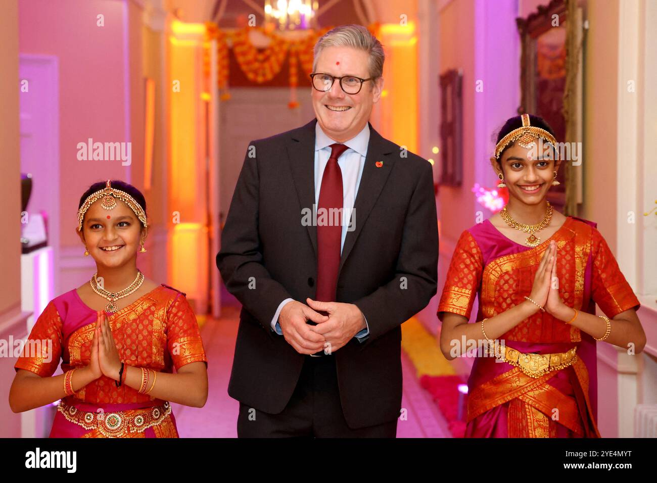 Prime Minister Sir Keir Starmer flanked by members of the ???Arunima ...