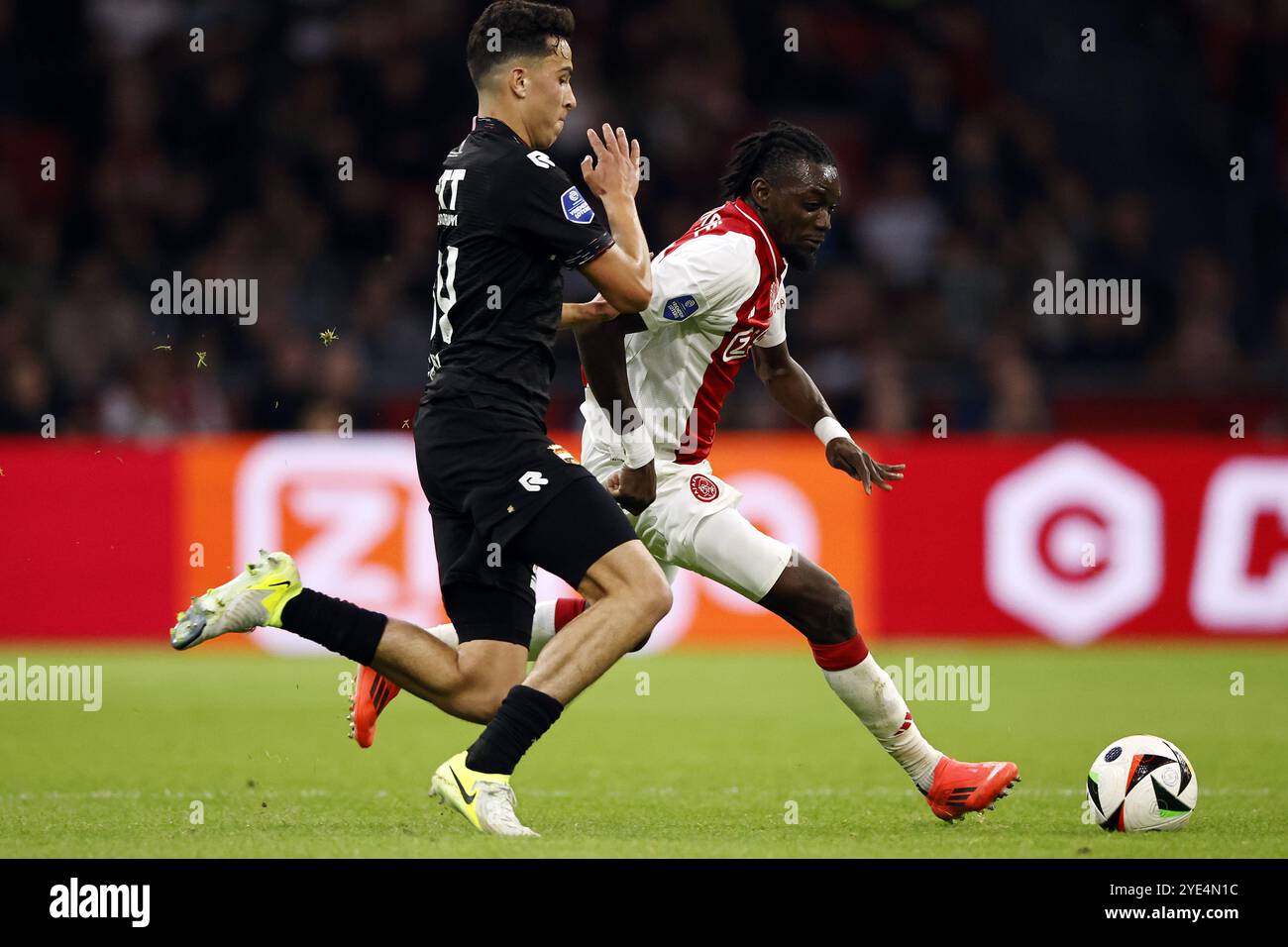 AMSTERDAM - (l-r) Amine Lachkar of Willem II, Bertrand Traore of Ajax ...