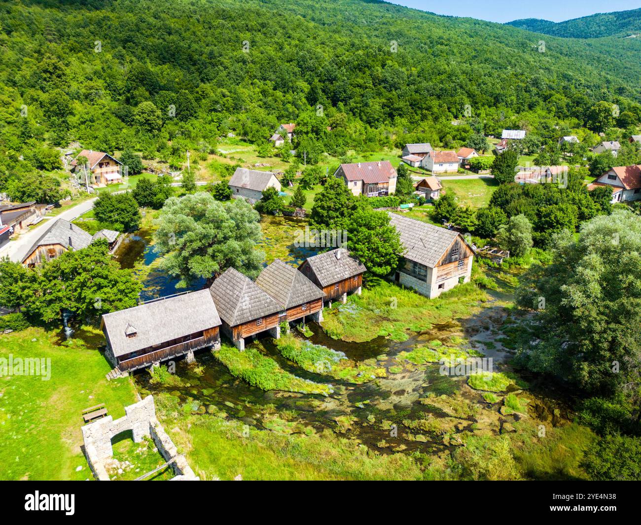 Aerial photo of Majerovo Vrilo, set of wooden mill houses on the source ...