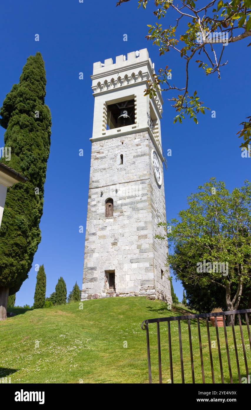 Bell tower next to the old castle's ruins in Fagagna, Italy Stock Photo ...