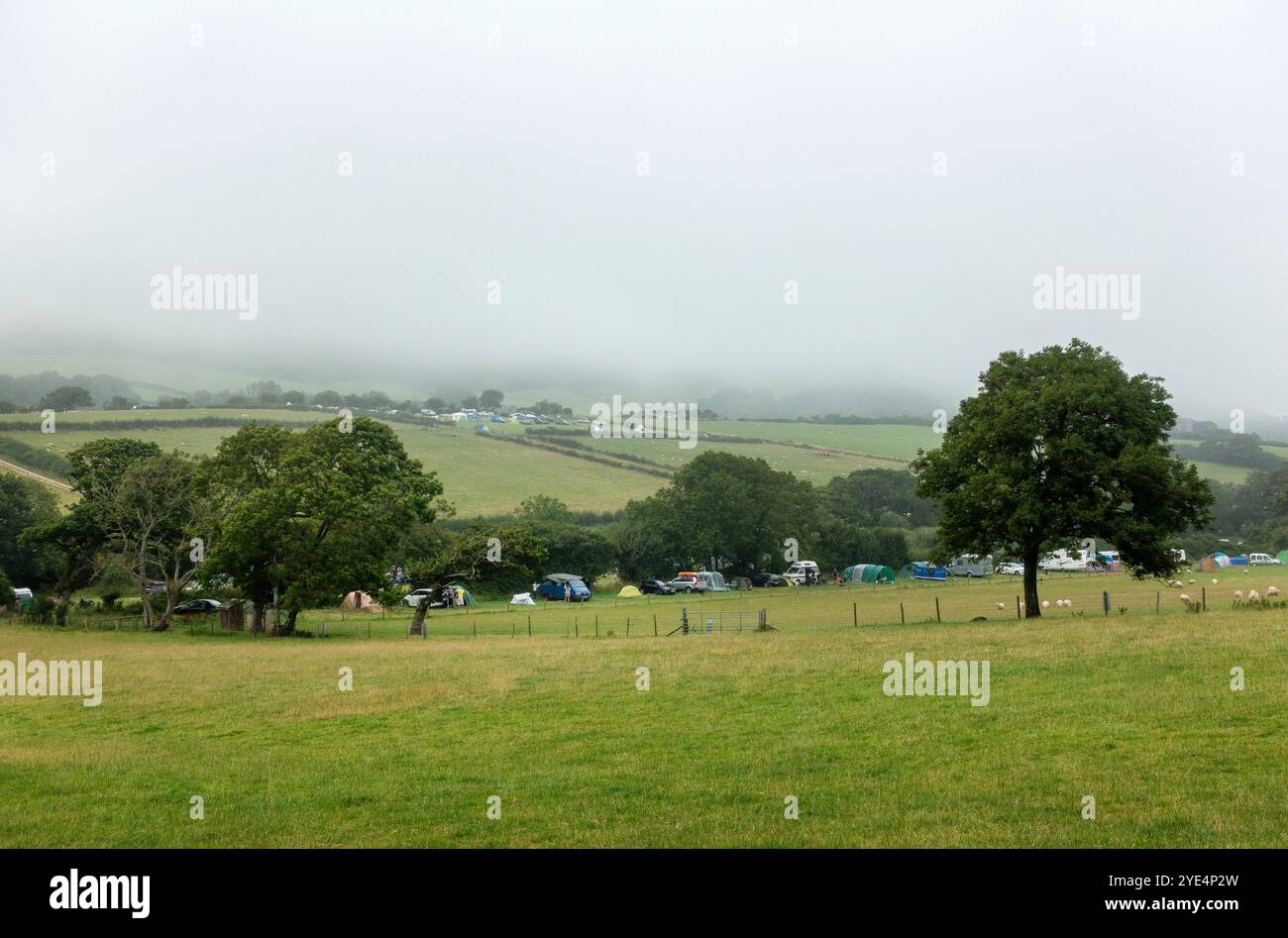On a misty summer day, visitors are unwinding at Steeple Leaze Campsite ...