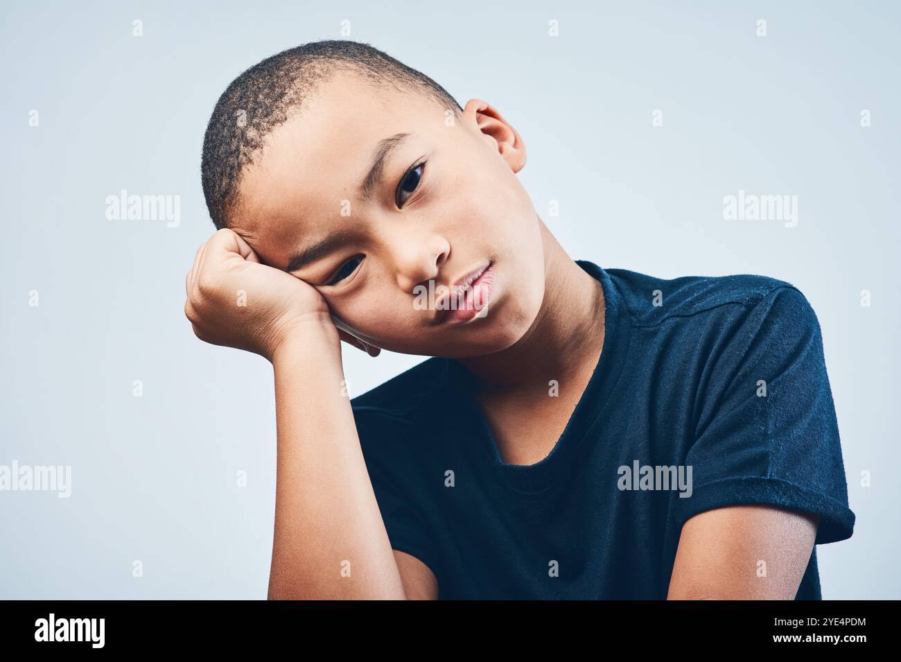 Portrait, grief and sad with boy, kid and facial expression on gray ...