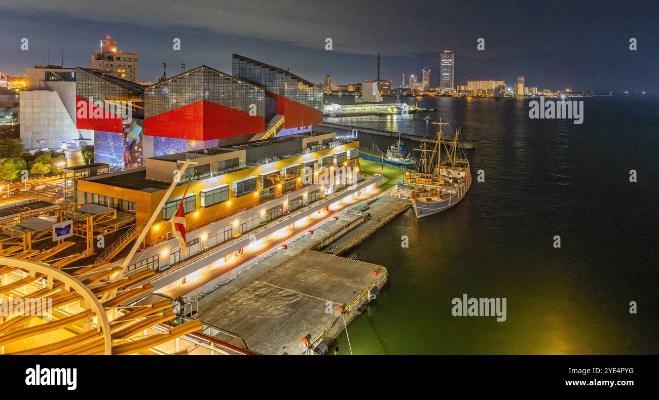Nightscape of illuminated buildings including Osaka Aquarium and a ...