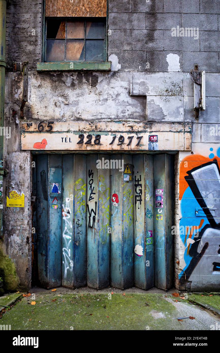 Graffiti covered weathered wall hi-res stock photography and images - Alamy