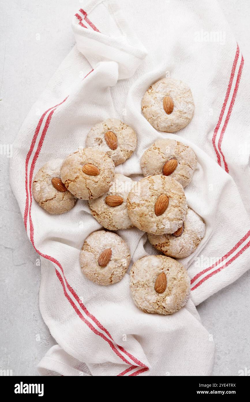 Italian almond cookies coated in powdered sugar, top view of round ...