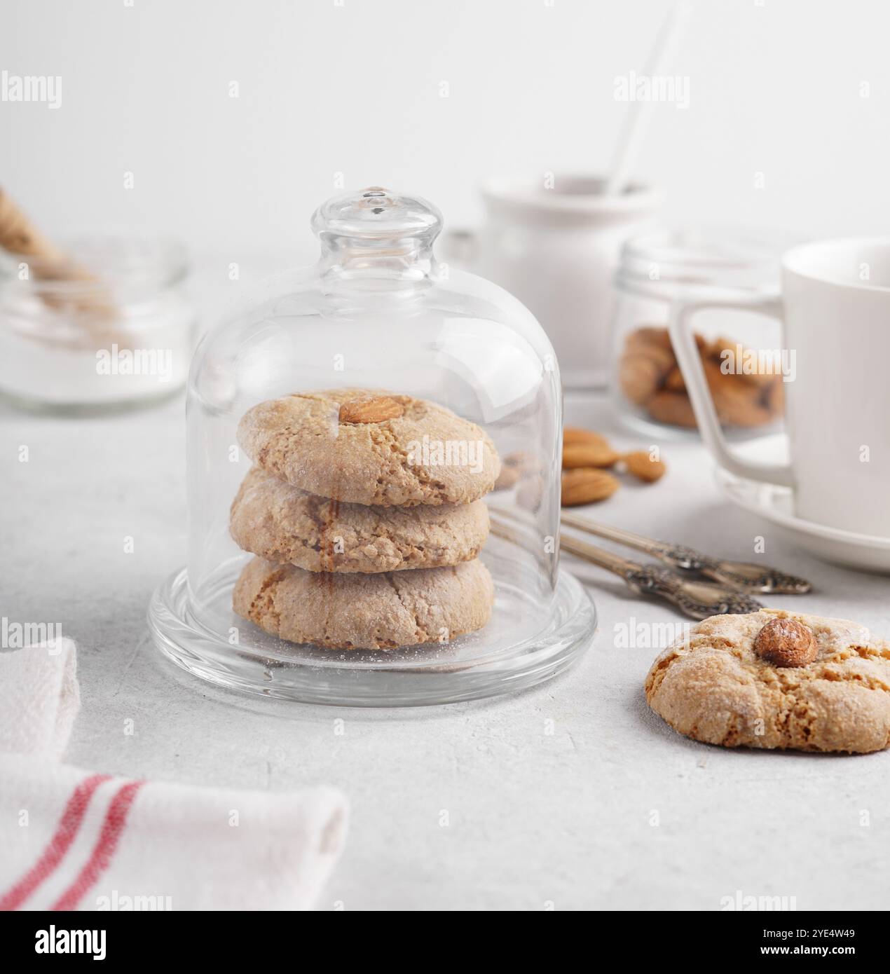 Almond cookies, served on glass plate on light table, Paste di Mandorle ...