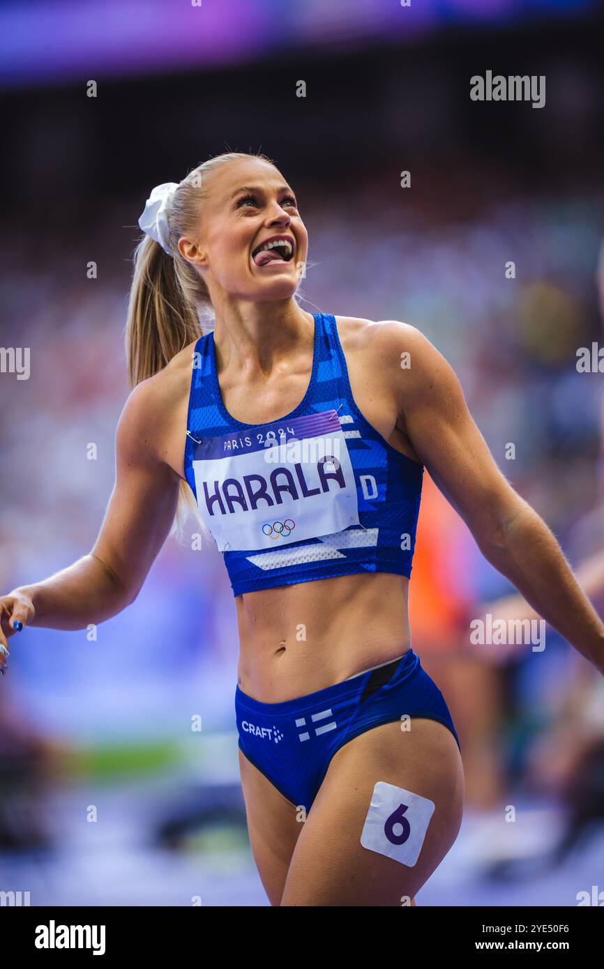 Lotta Harala participating in the 100 meters hurdles at the Paris 2024 ...