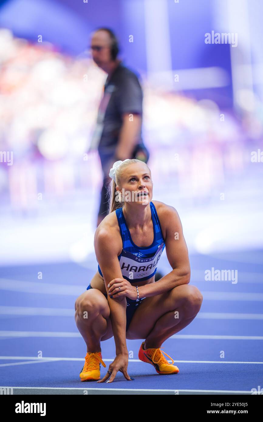 Lotta Harala participating in the 100 meters hurdles at the Paris 2024 ...