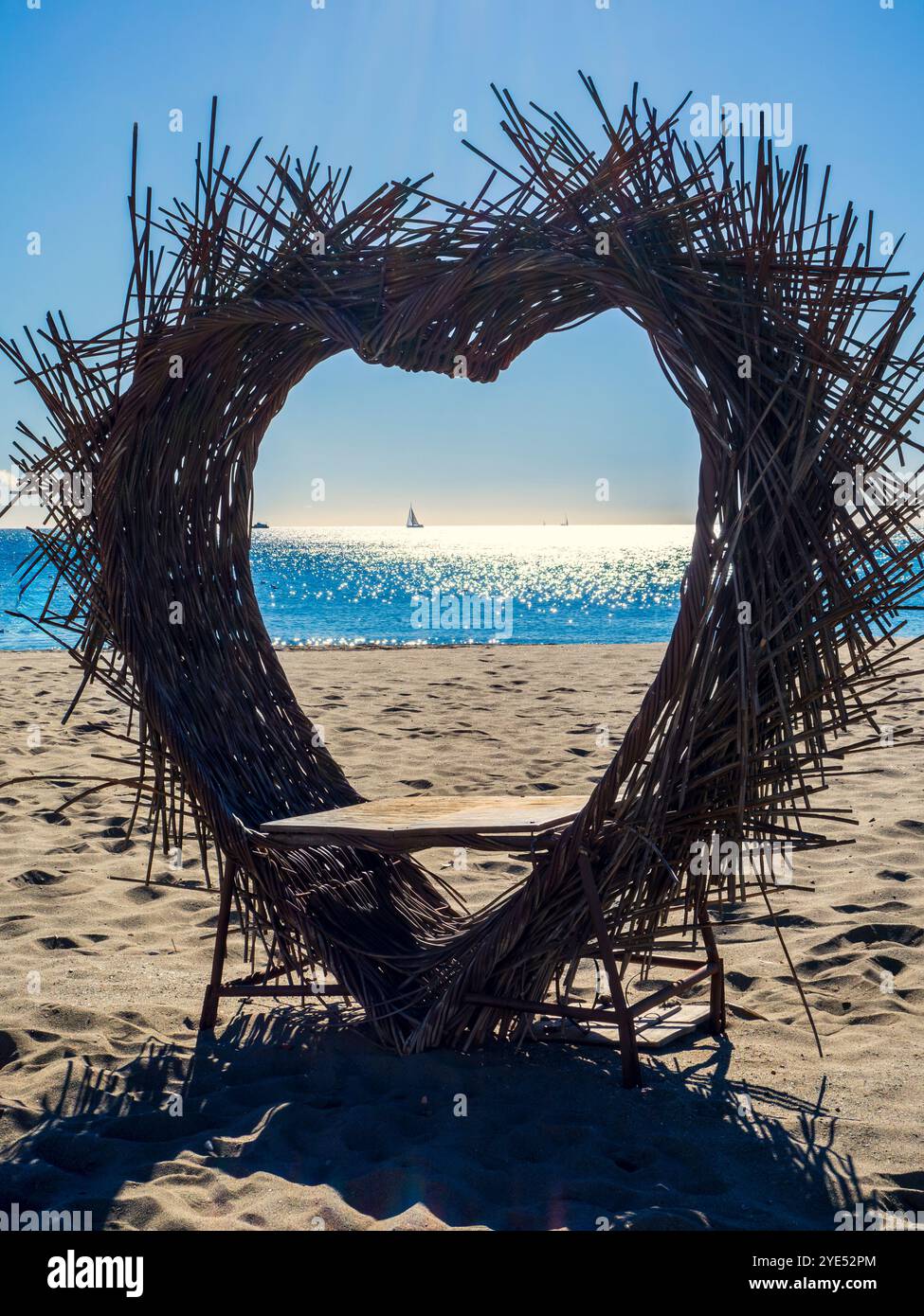 Heart of reed on the beach of Benalmádena, Spain Stock Photo - Alamy