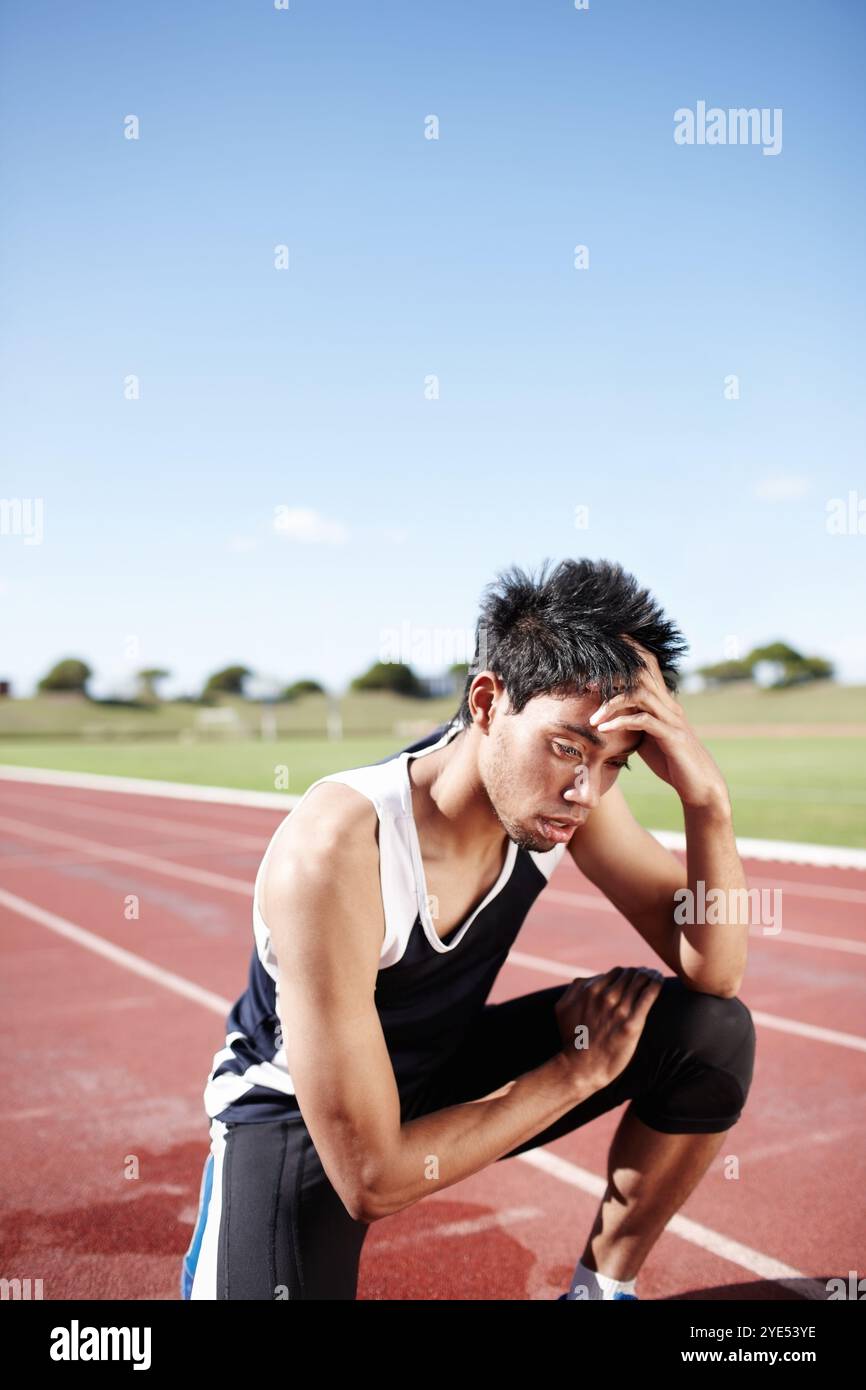 Tired, man and runner on track for running with training for race ...