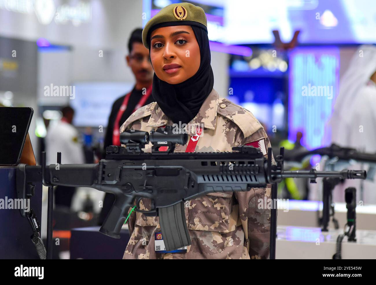 THE MILIPOL QATAR 2024 EXHIBITION IN QATAR A woman officer of Qatar ...