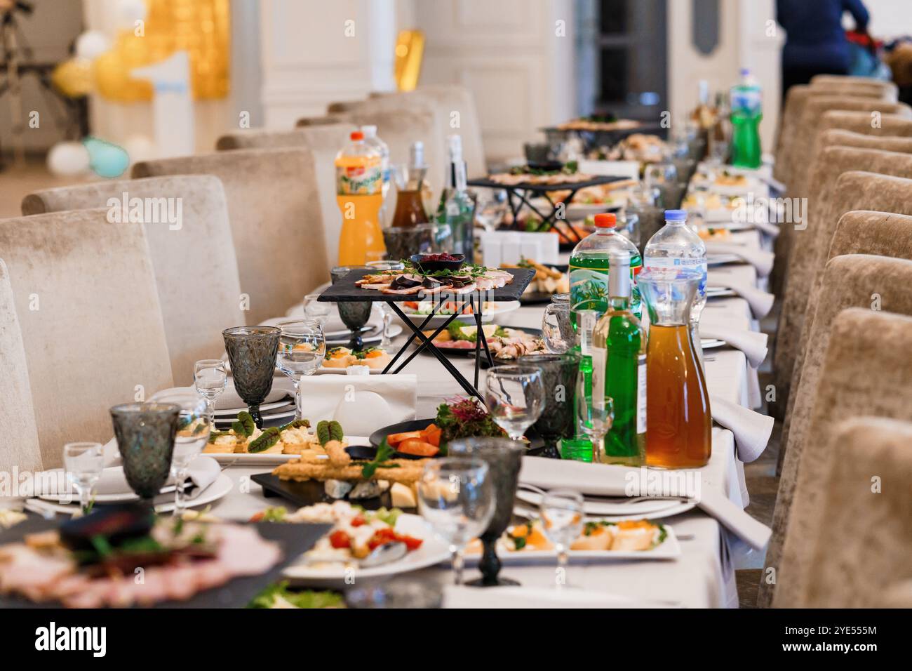 Elegant Banquet Table Setting with Assorted Dishes and Beverages Stock Photo - Alamy