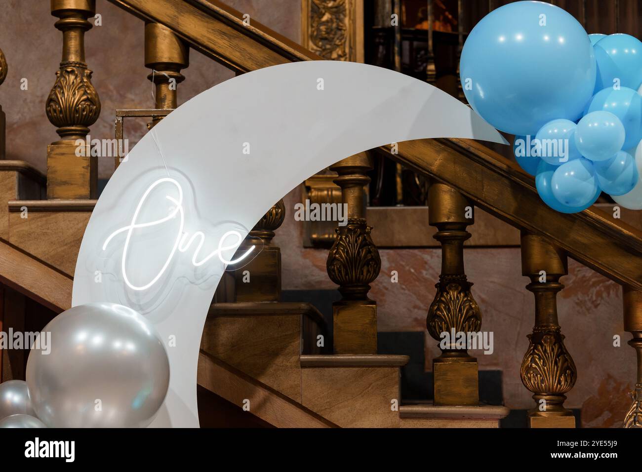 Elegant First Birthday Celebration Setup with Neon Sign and Balloons ...