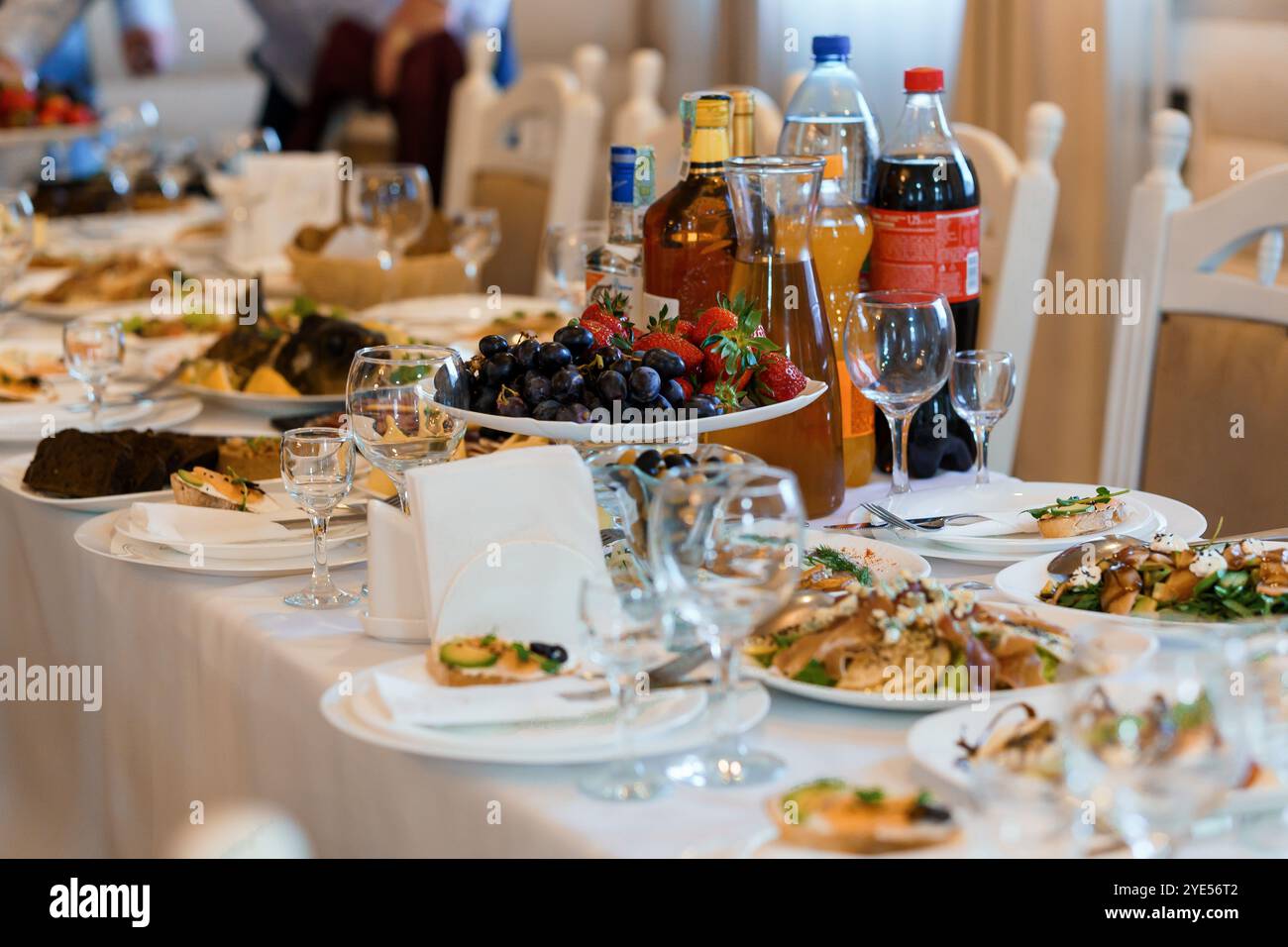 Lavish Banquet Table Set with Assorted Dishes and Beverages Stock Photo - Alamy