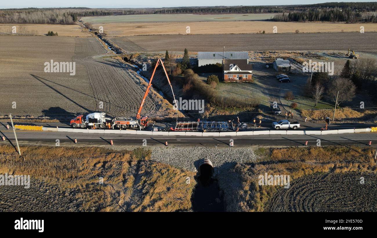 Nedelec, Quebec, Canada, 2021-11-10, Concrete pump pouring concrete for ...