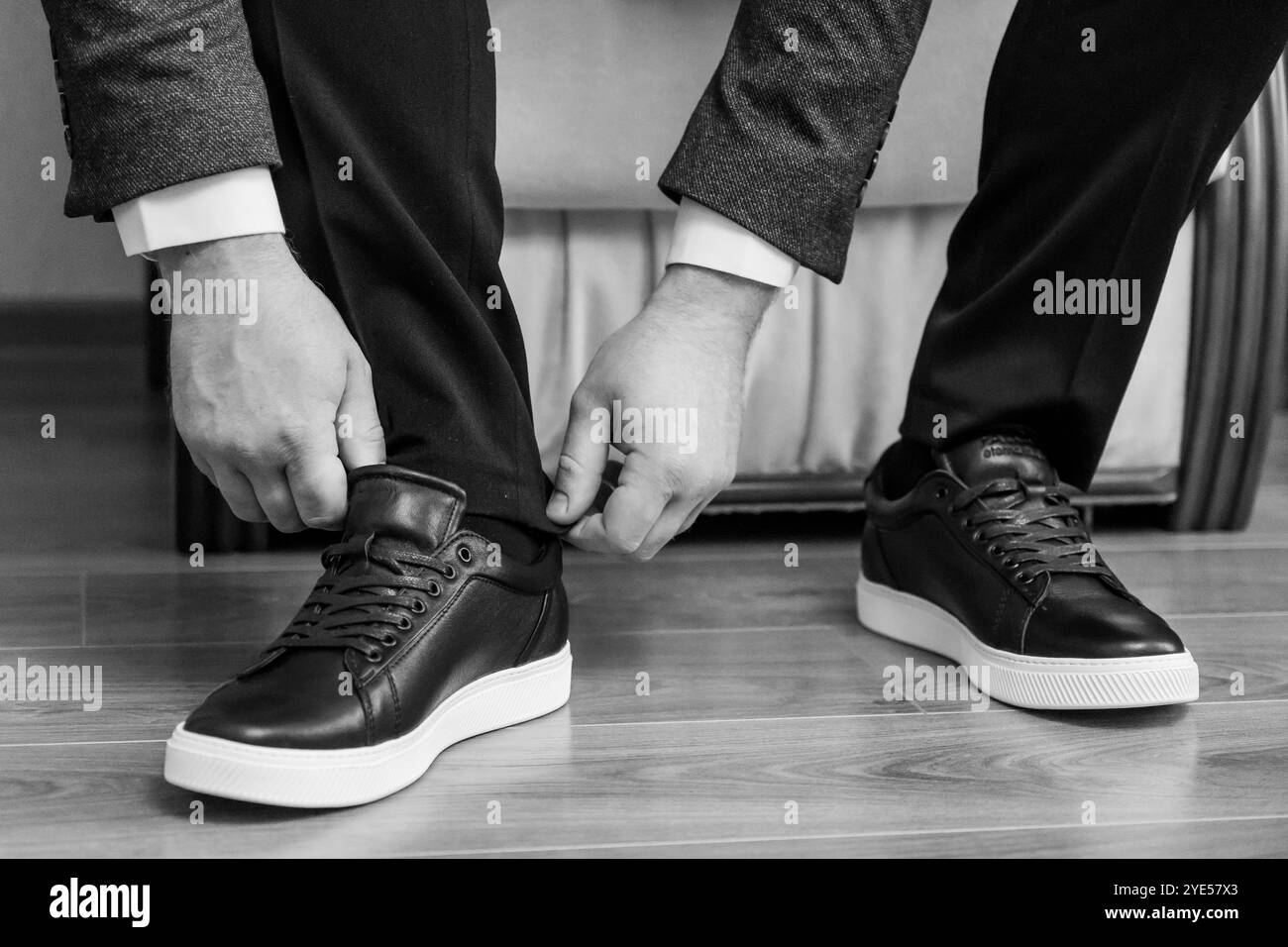 Adjusting shoes hi-res stock photography and images - Alamy