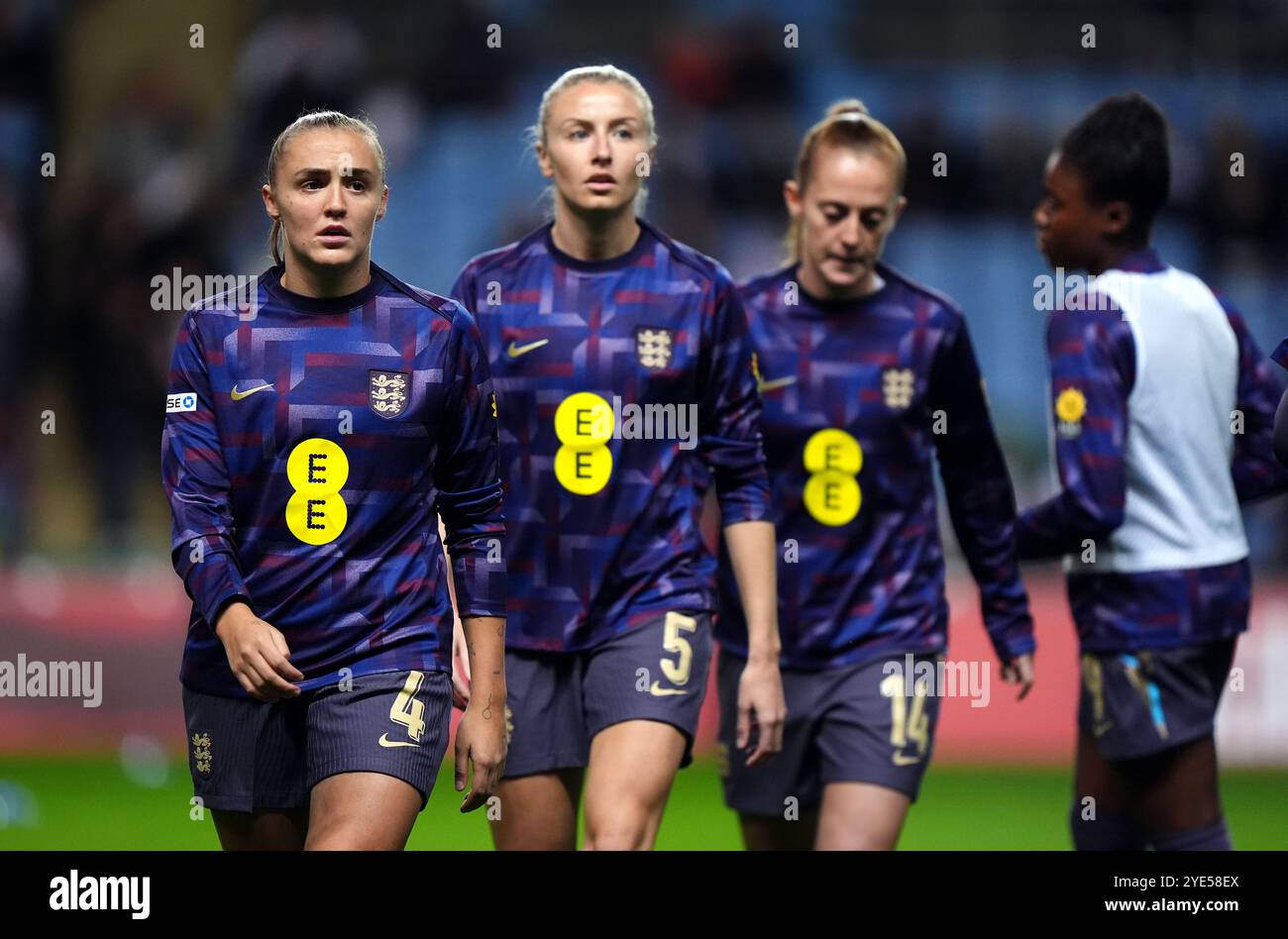 England's Georgia Stanway, Leah Williamson and Keira Walsh (left to right) warm up before an ...