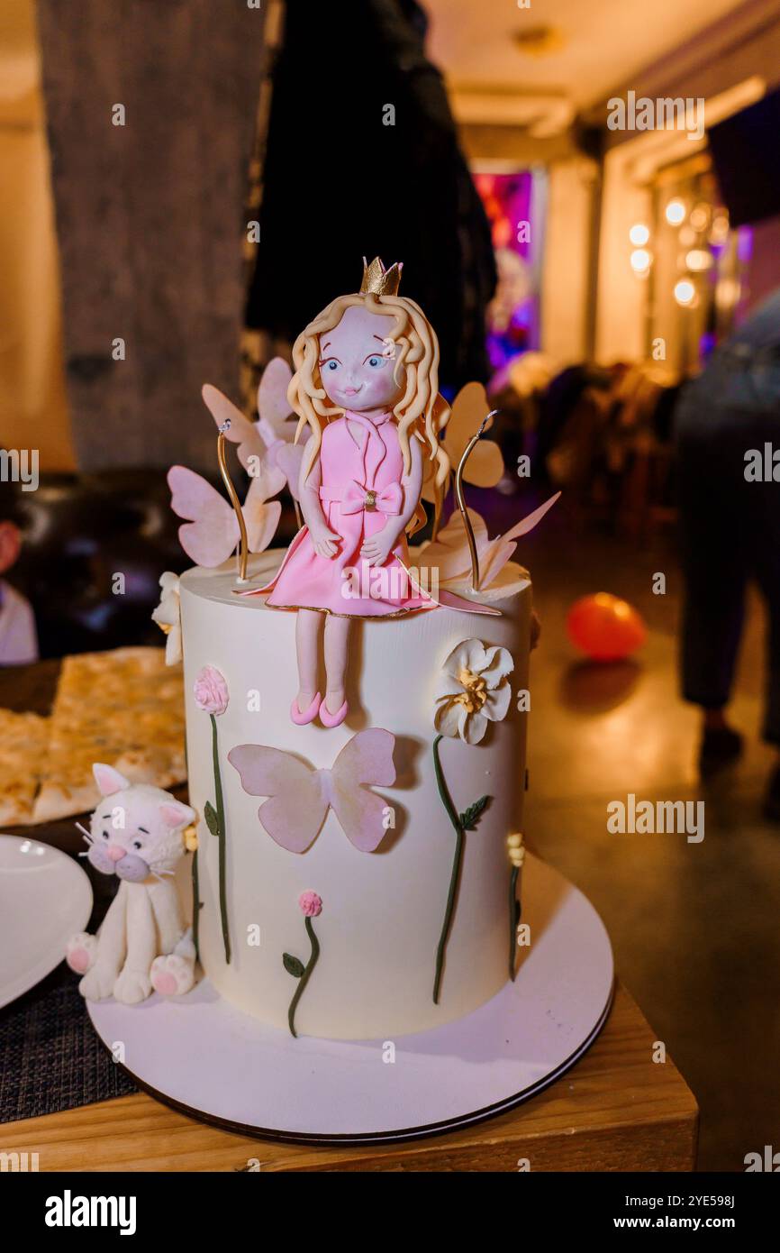 Elaborate Princess-Themed Cake with Fondant Decorations and Cute ...