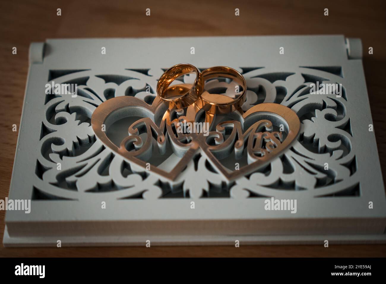 Elegant Wedding Rings with Mr and Mrs Wooden Display Stock Photo - Alamy