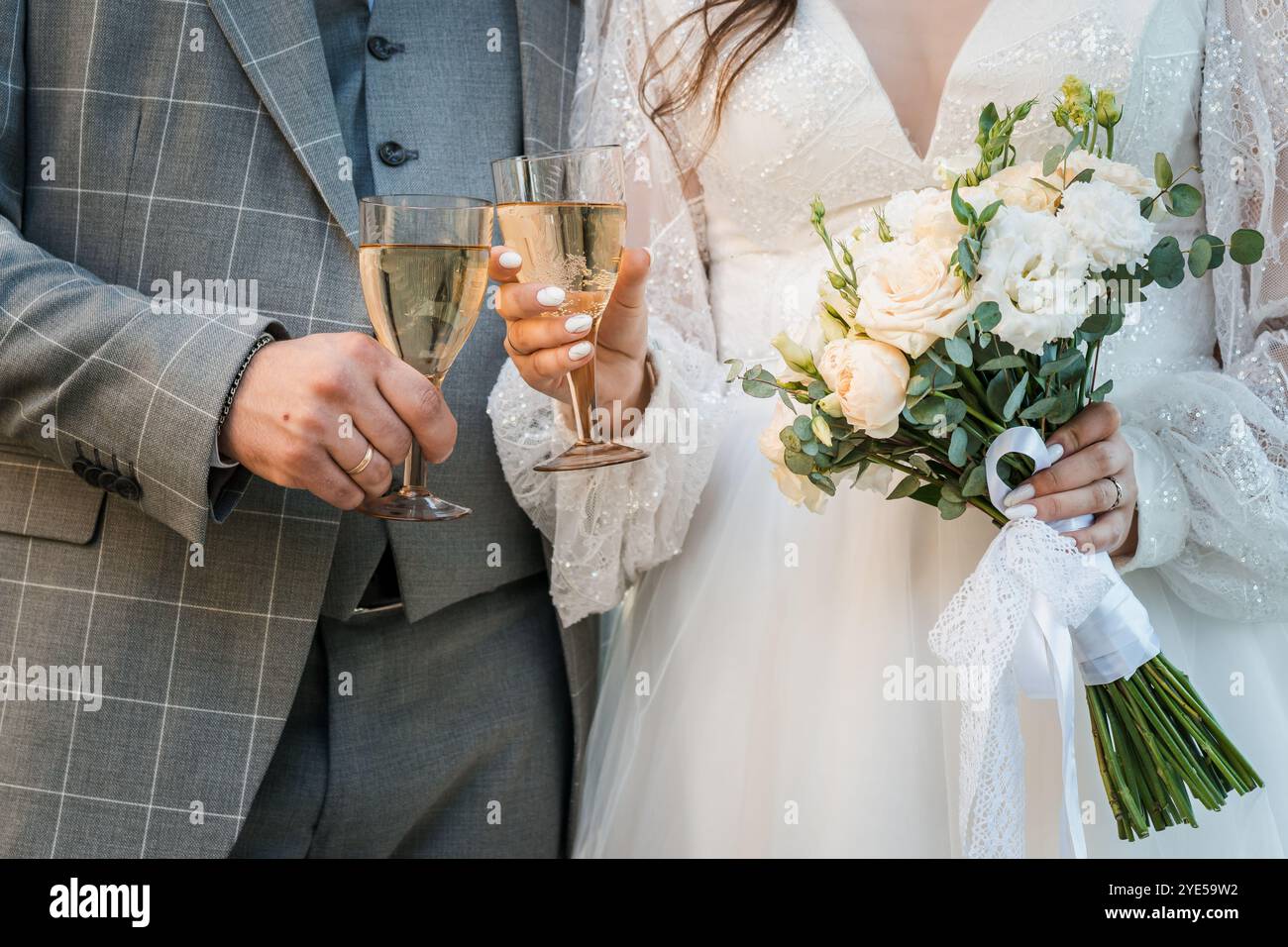 Romantic Wedding Toast Celebration with Champagne and Bridal Bouquet ...