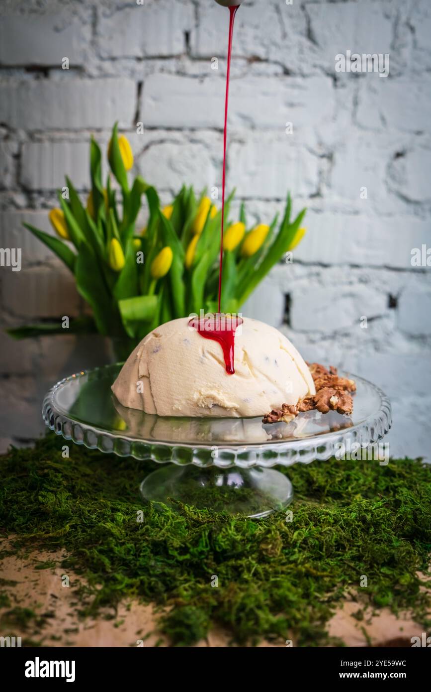 dessert covered with red icing Stock Photo - Alamy