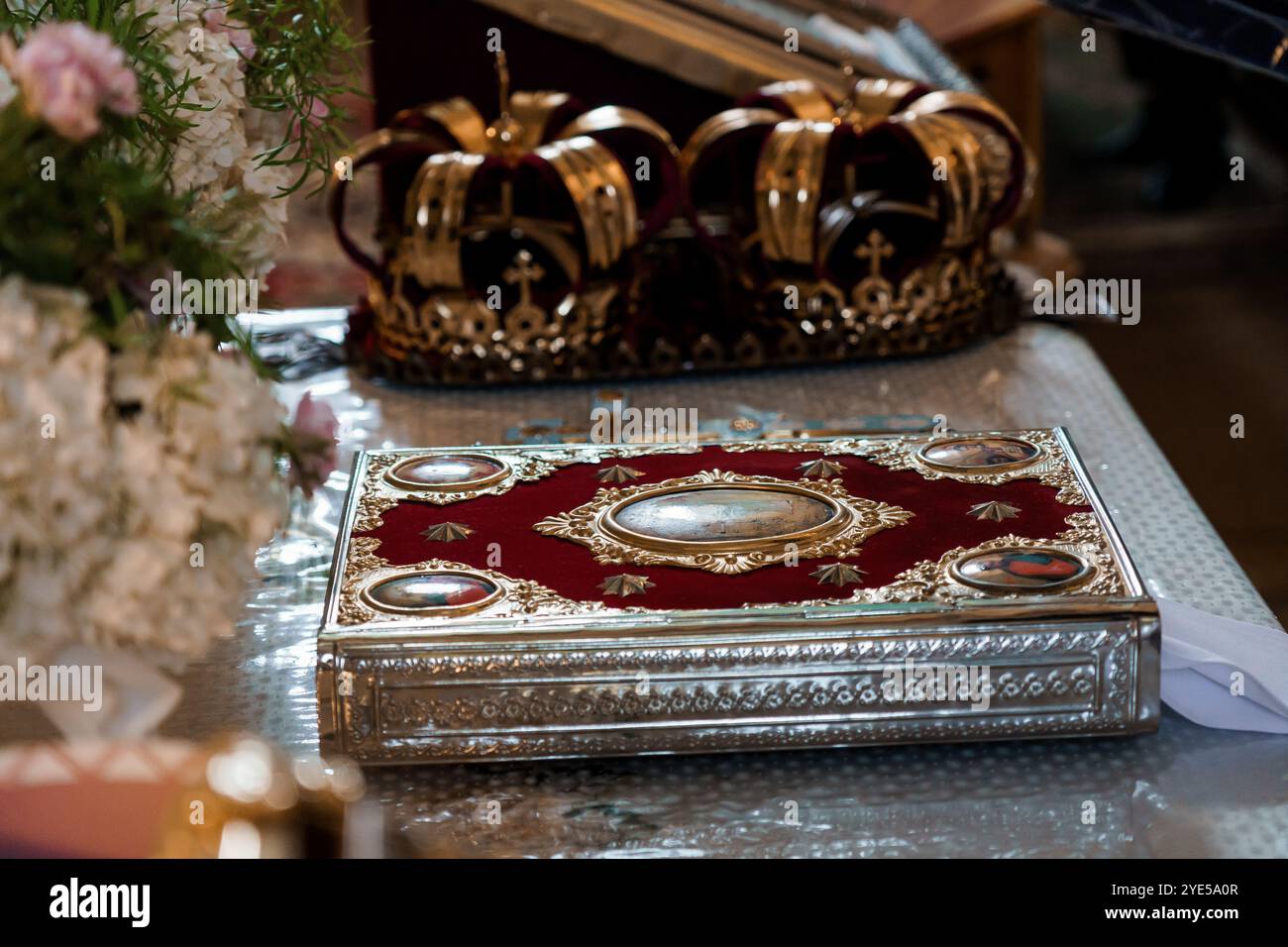 Ornate Royal Crown Jewels and Decorative Book on a Table Stock Photo ...