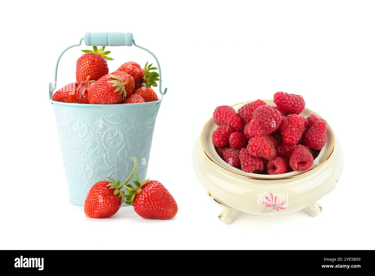 Bowl bucket red raspberries Cut Out Stock Images & Pictures - Alamy