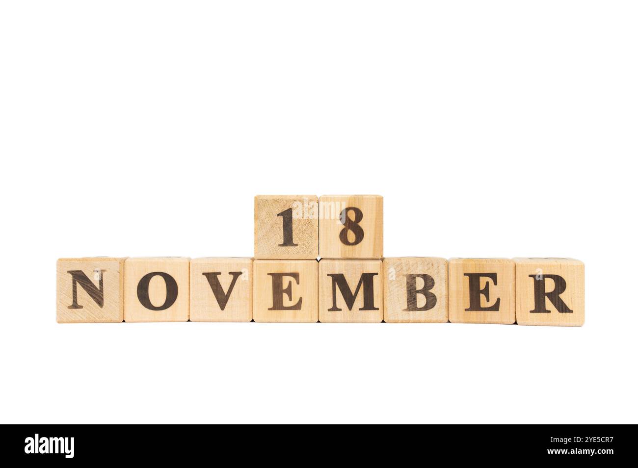 November 18, Wooden cube on isolated white background. Jonestown ...