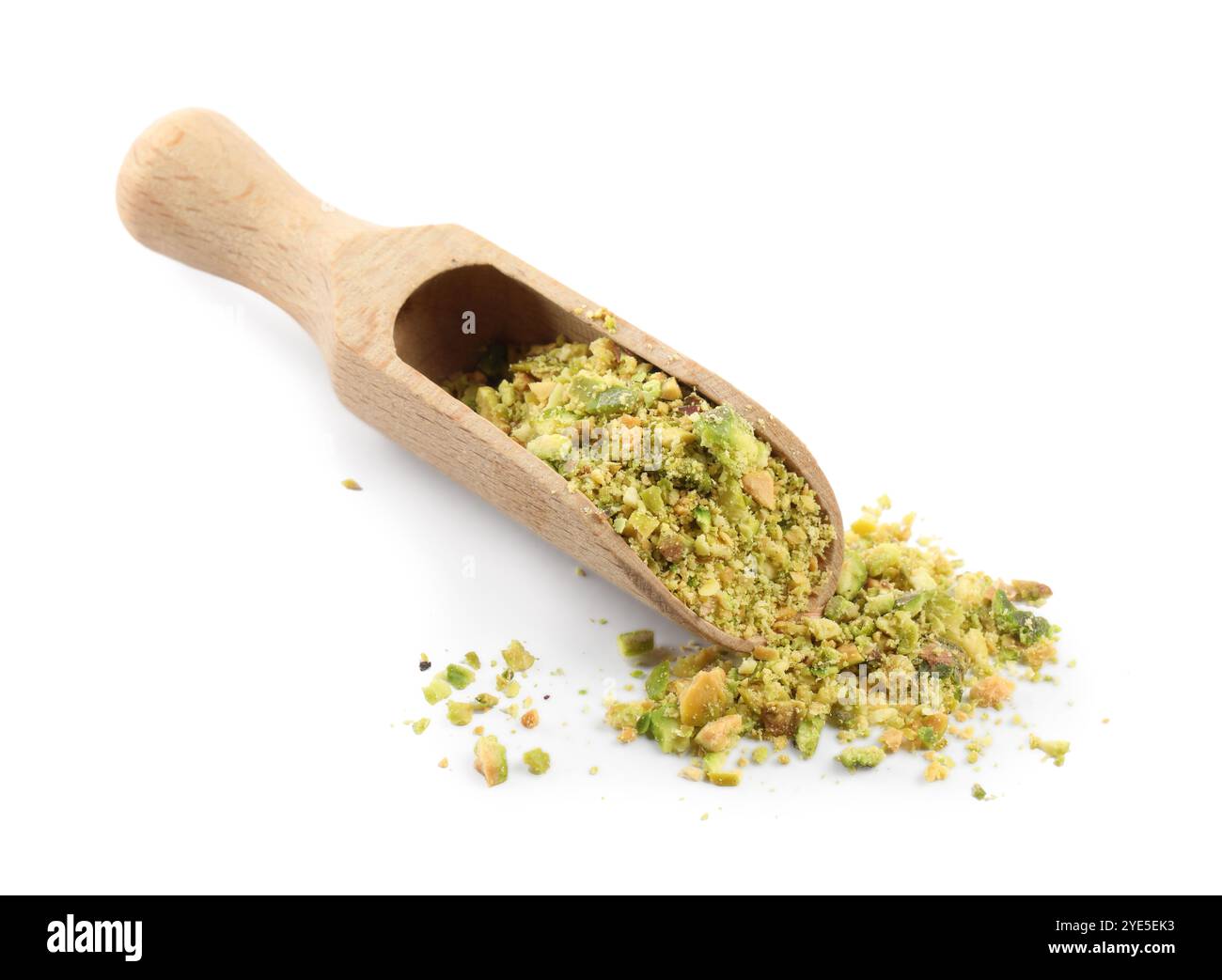Pieces of peeled pistachio nut in wooden scoop isolated on white Stock ...