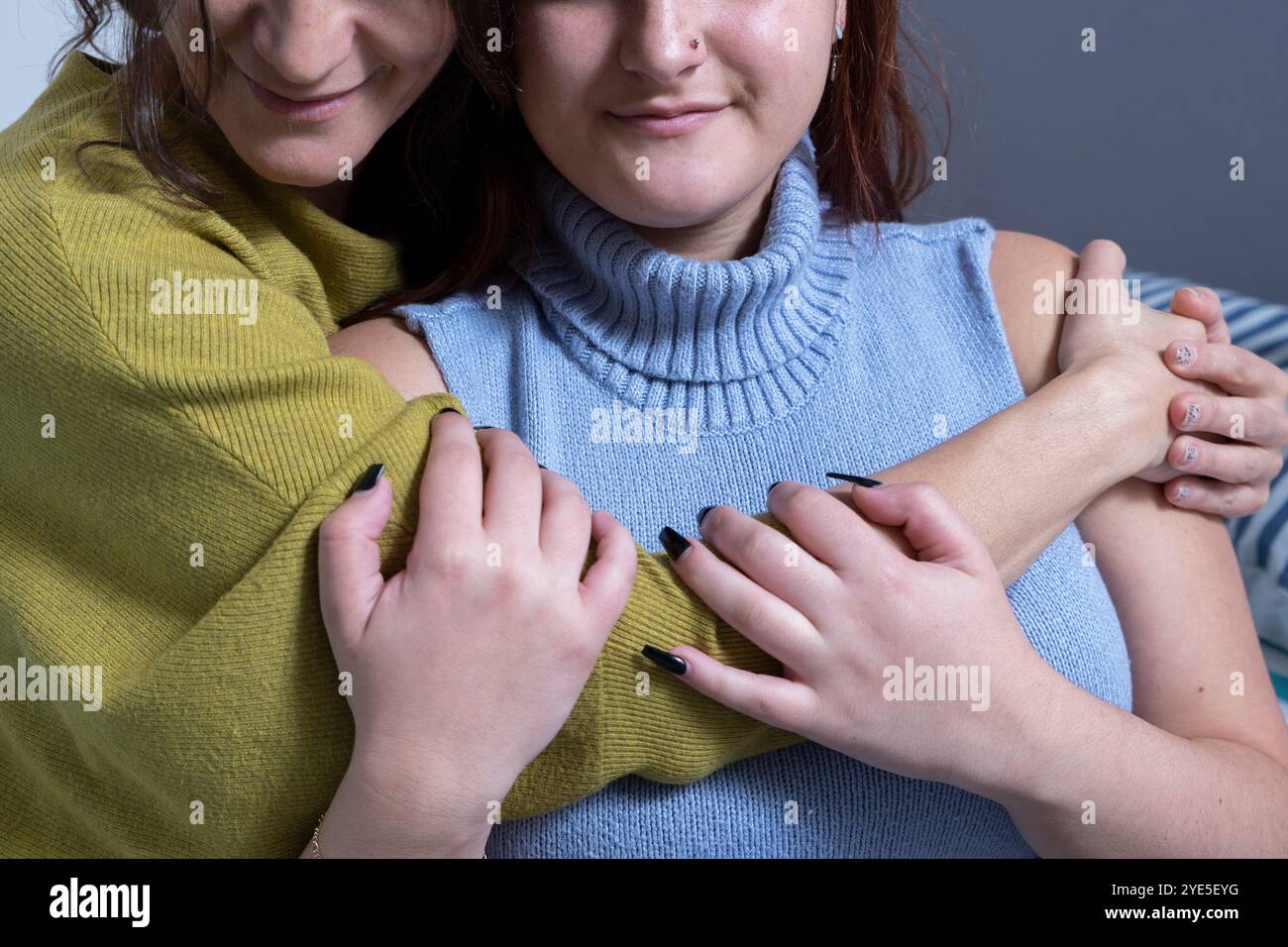 Mom and daughter embracing an intimate family moment Stock Photo - Alamy