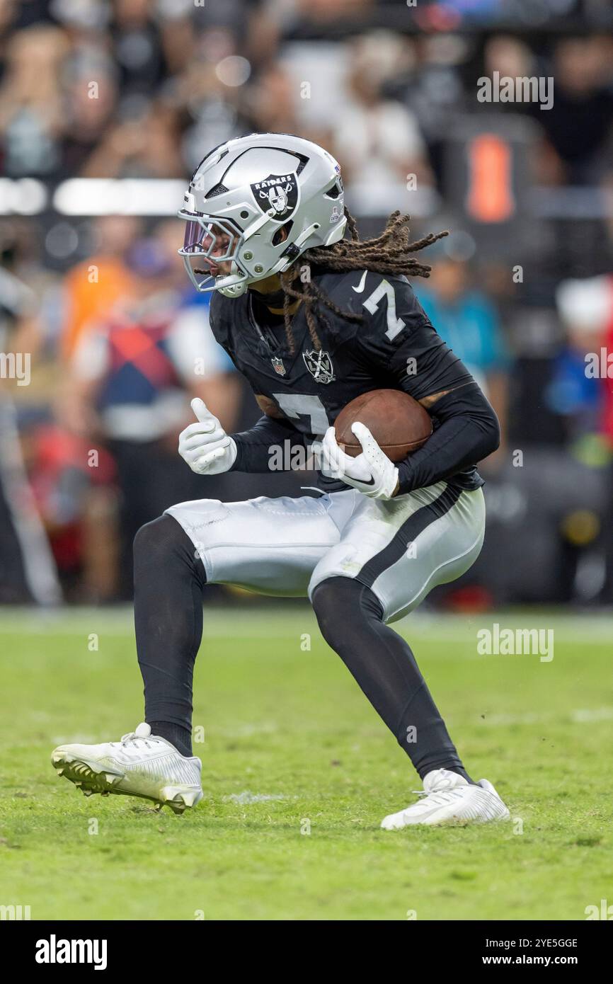 Las Vegas Raiders safety Tre'von Moehrig (7) intercepts a pass and runs ...