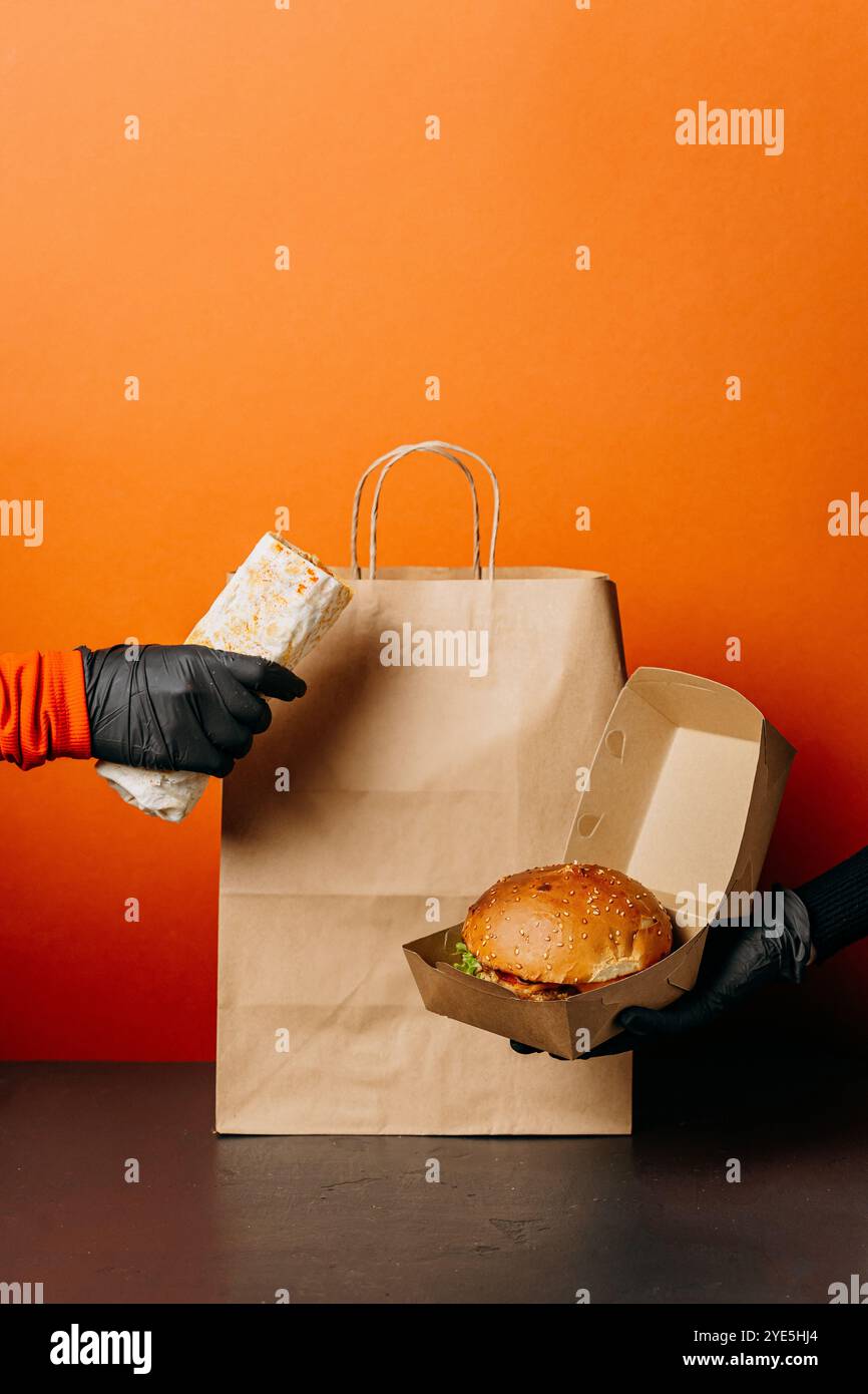 Burger and wrap takeaway with eco-friendly packaging for delivery ...