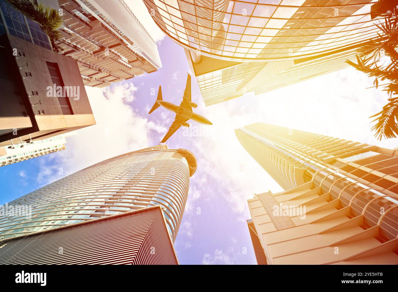 Miami skyline with jet airplane in low flight view, Florida state ...