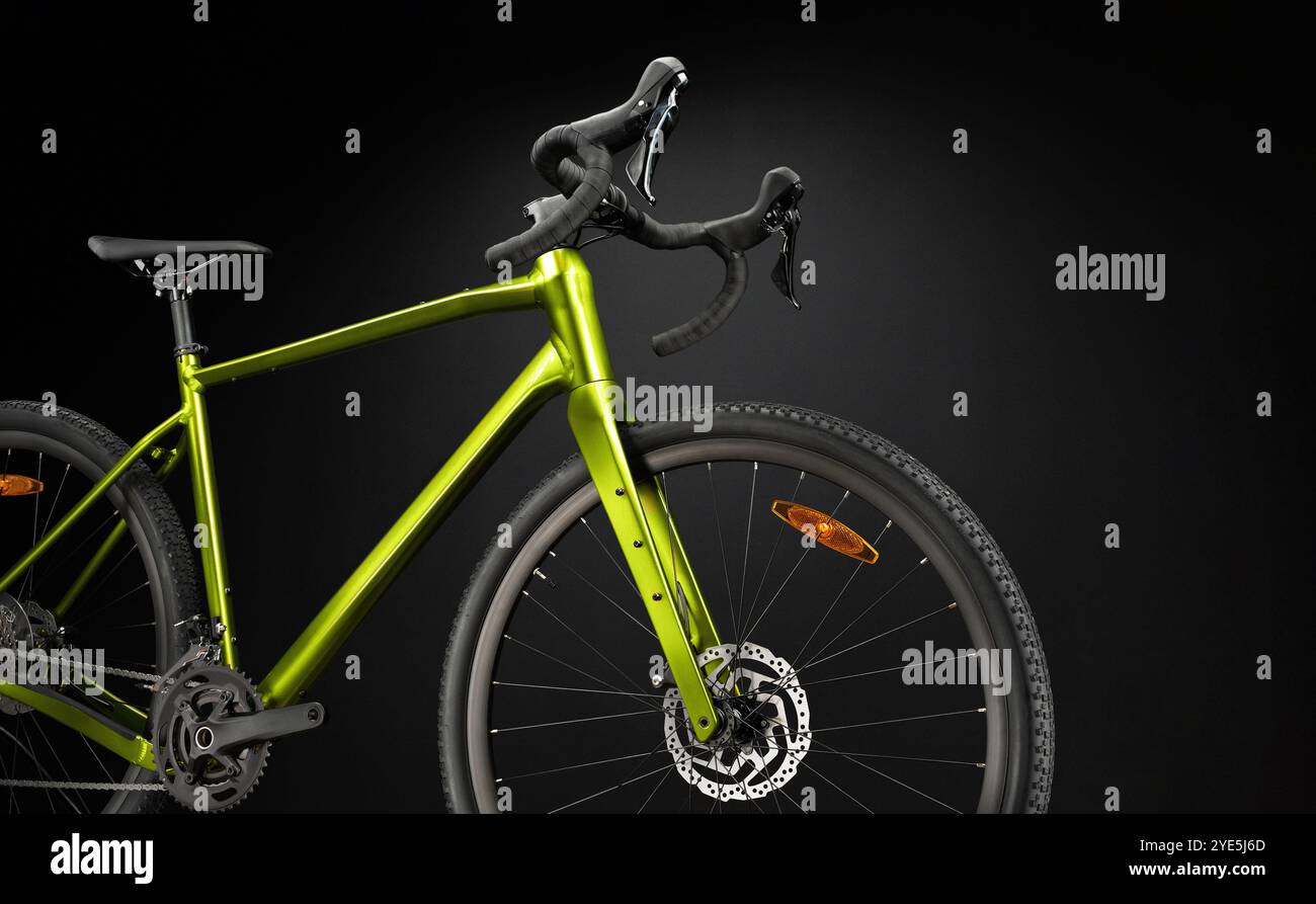 Green gravel bike with modern design, drop handlebars, and disc brakes ...
