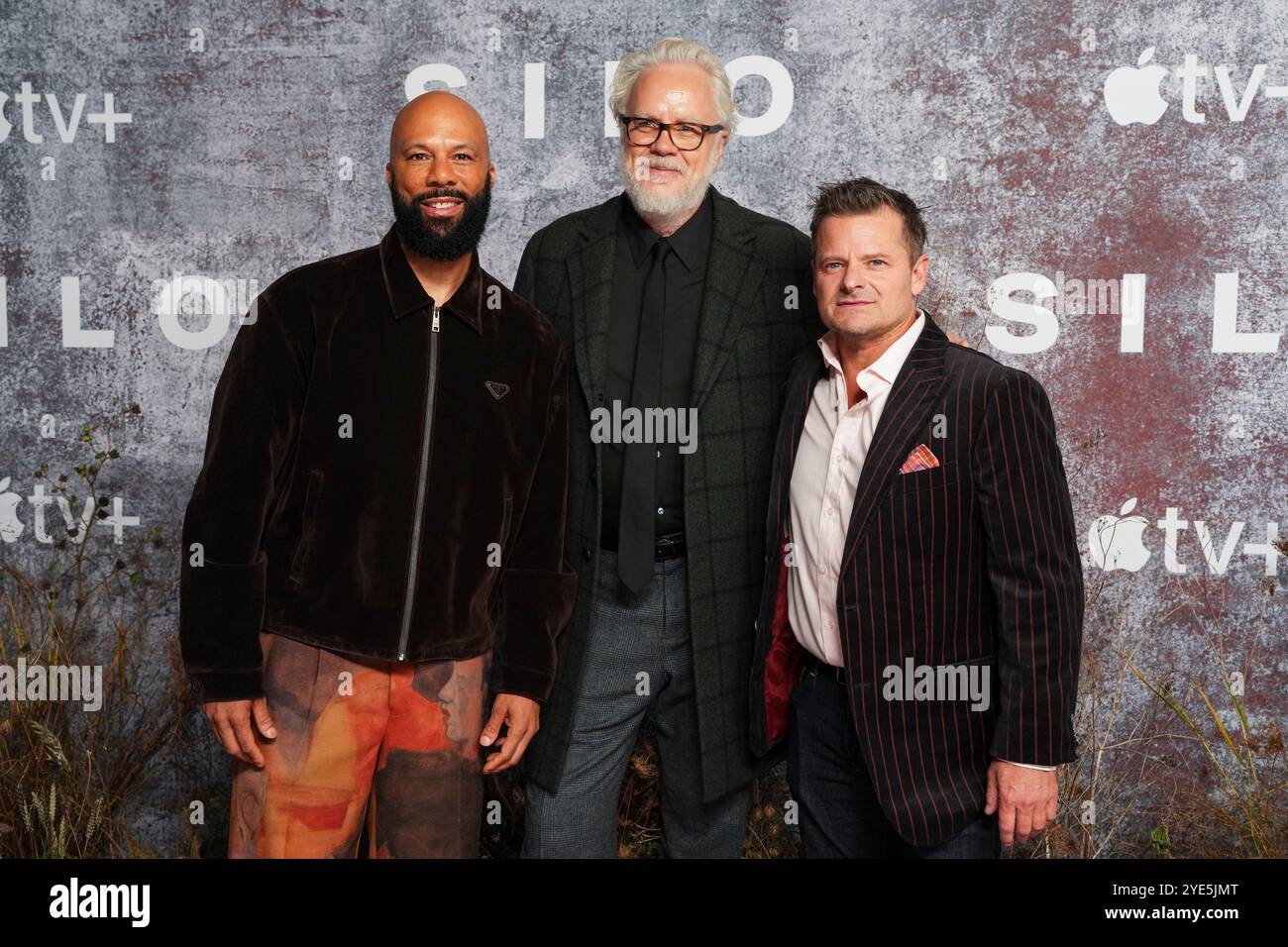 Common, from left, Tim Robbins, and Steve Zahn pose for photographers ...