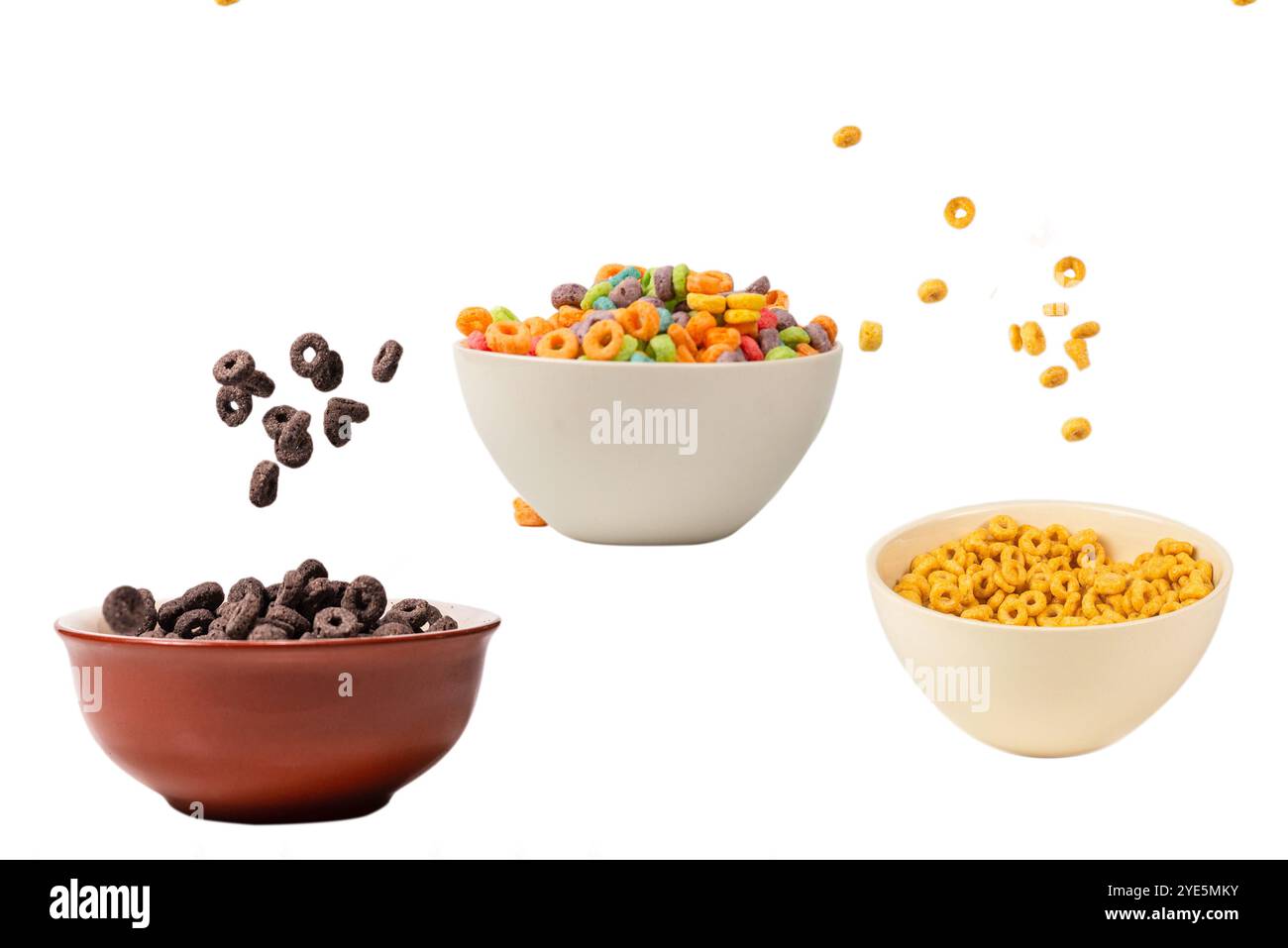 Honey rings cereal box for morning breakfast. Corn flakes falling to ...