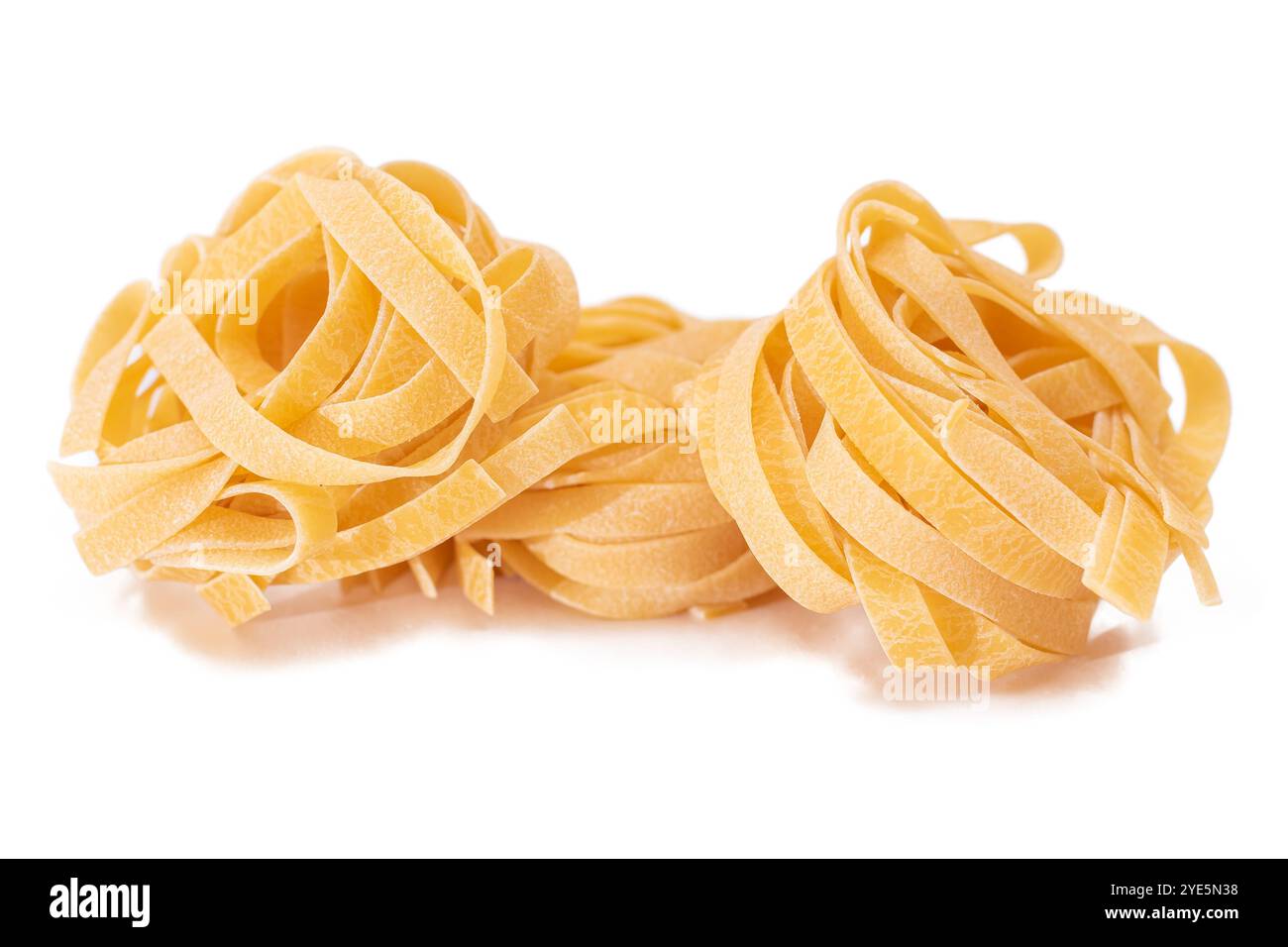 Three Classic Italian Raw Egg Fettuccine - Isolated on White Background ...