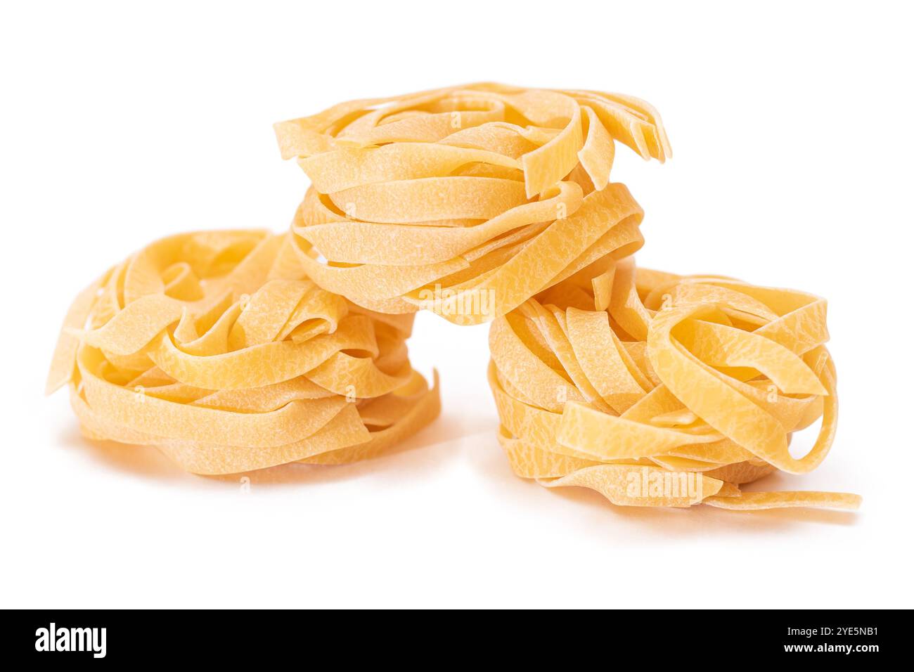 Three Classic Italian Raw Egg Fettuccine - Isolated on White Background ...