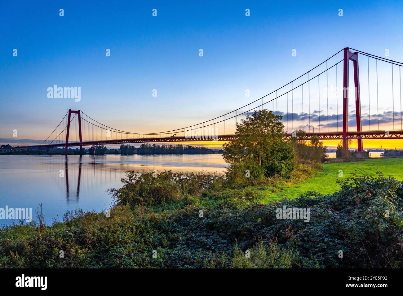 The Rhine bridge Emmerich, federal road B220, evening light, with 803 m ...