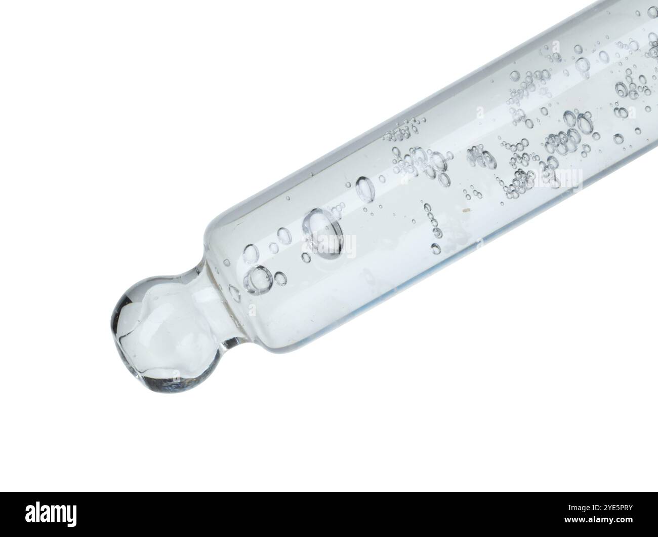 Dripping cosmetic serum from pipette on white background Stock Photo ...