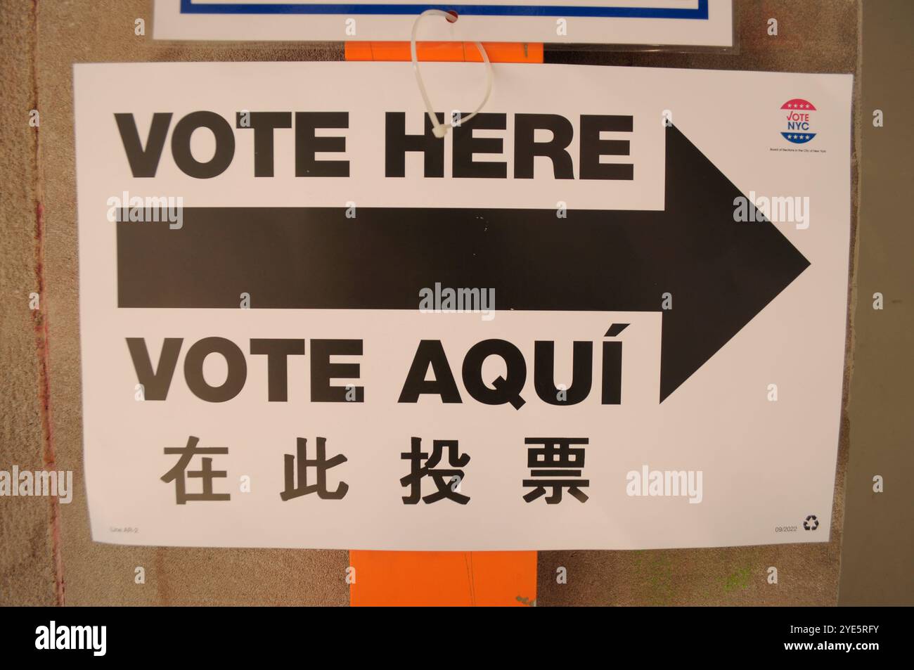 A sign directs people to a voting site for the 2024 United States ...