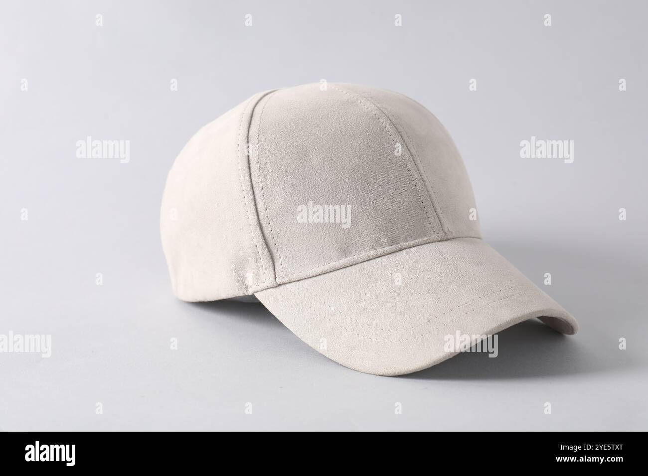 Stylish baseball cap on light grey background, closeup. Mockup for ...