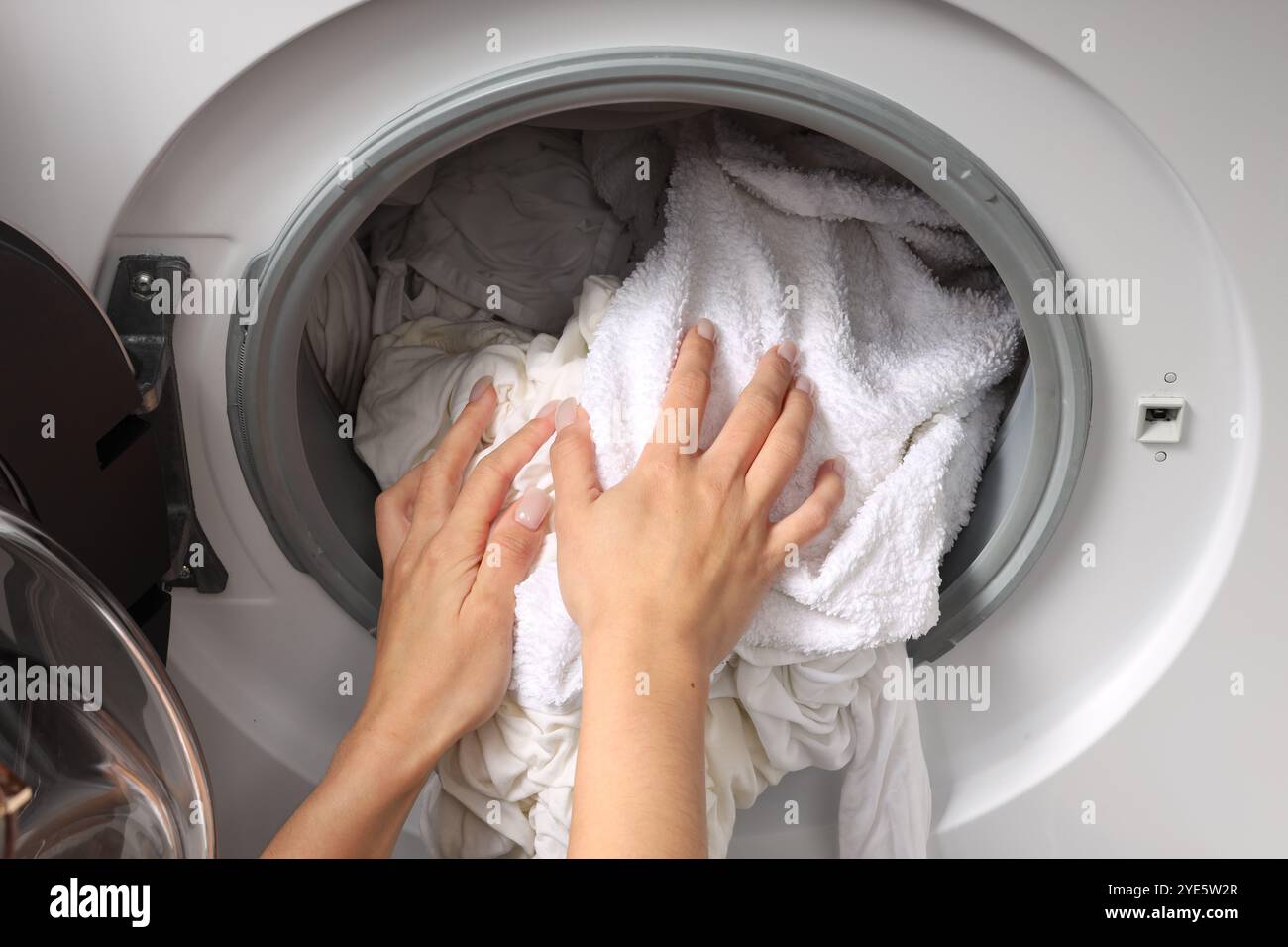 Woman putting out washing hi-res stock photography and images - Alamy