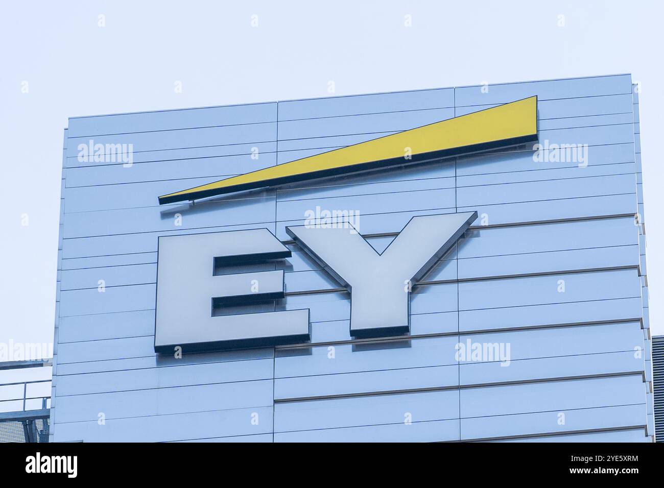 Ernst & Young signage is being pictured in Warsaw Stock Photo - Alamy