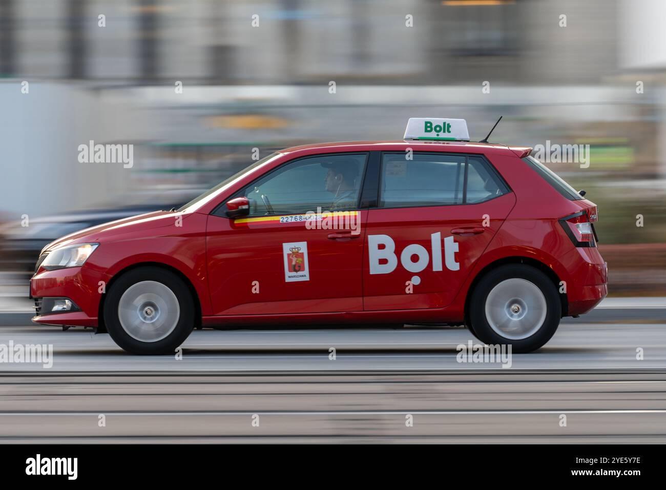 A Bolt taxi cab seen moving in the street in Warsaw Stock Photo - Alamy