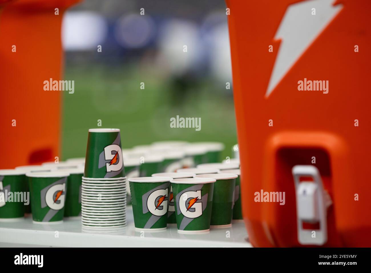 Gatorade cups sit by the bench before an NFL football game between the ...
