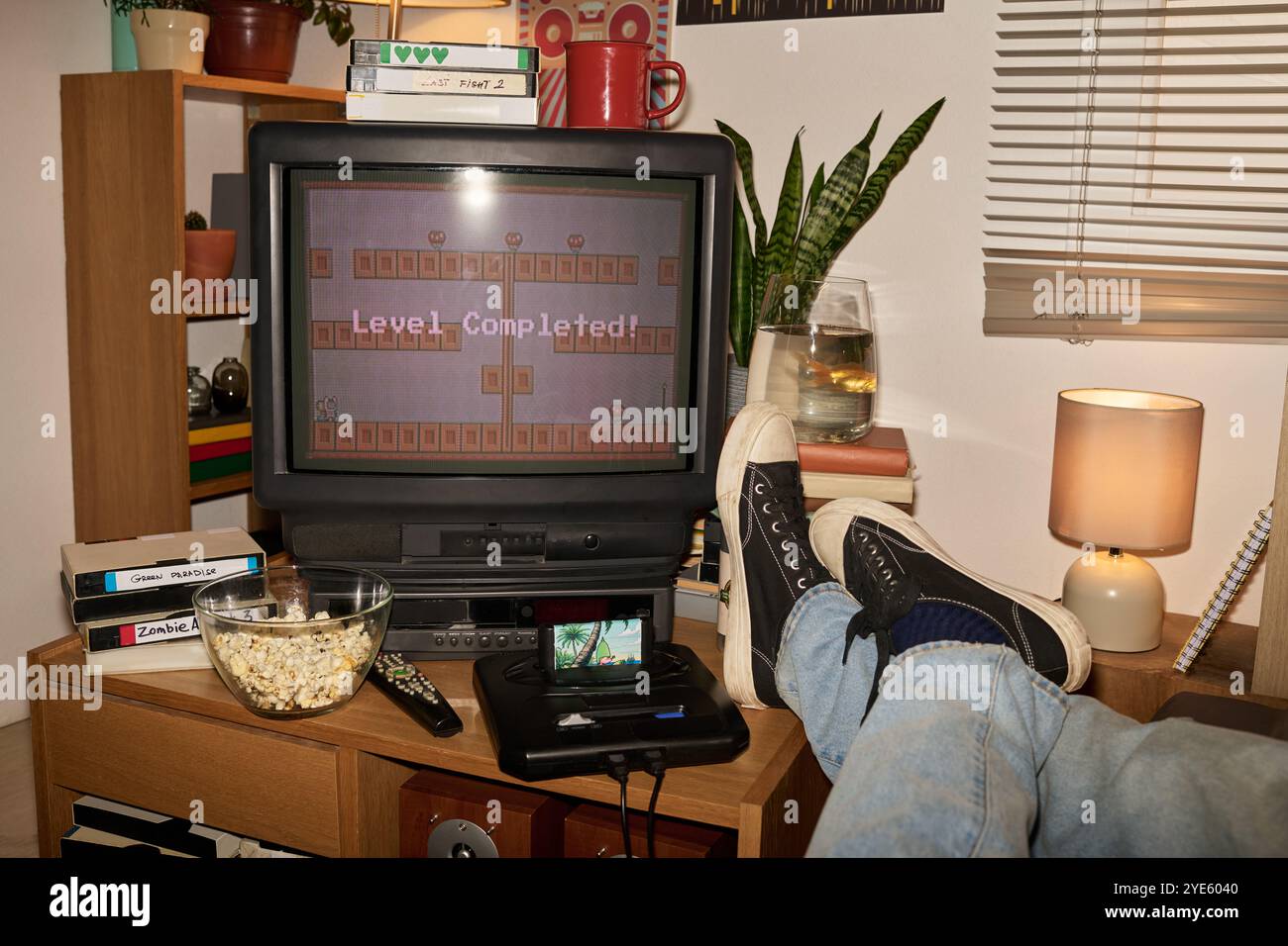 Retro gaming setup with vintage television and retro game console ...