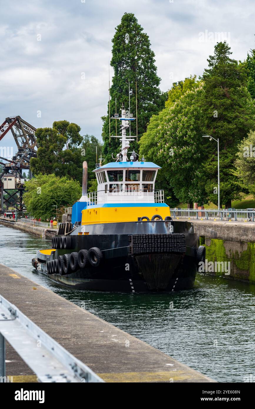 Tugboat Sailing through the Ballard Locks in Seattle, Washington Stock ...
